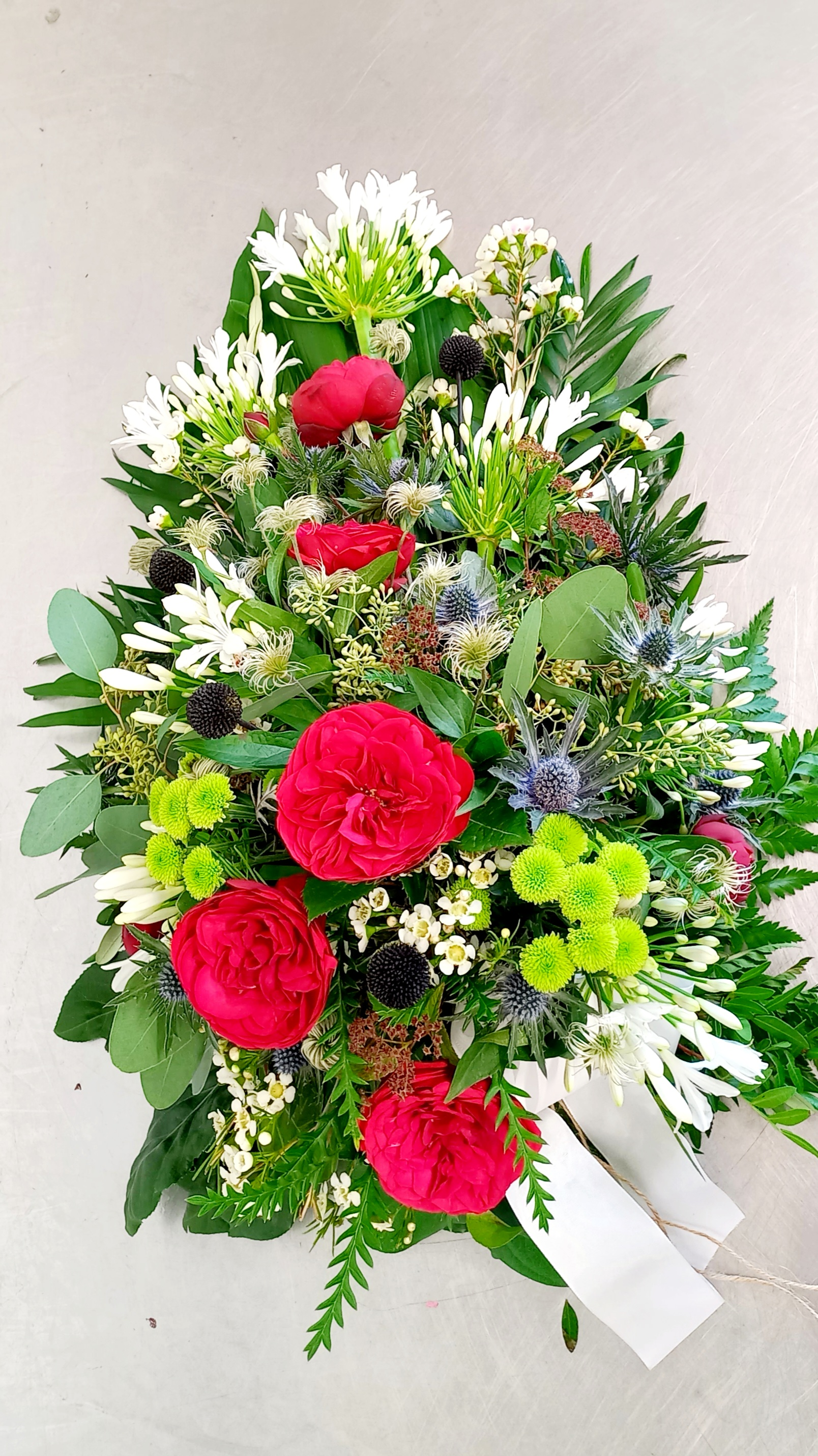 Suruun/osanotto ja hautajaiset – kukkivaoksa